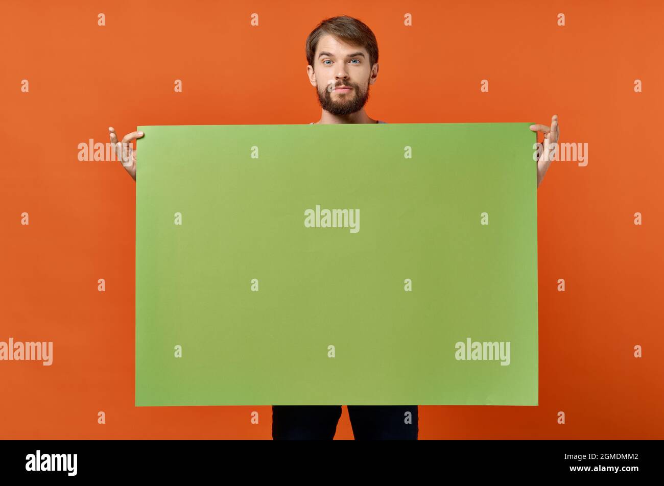 bearded man holding a green banner design isolated background Stock ...