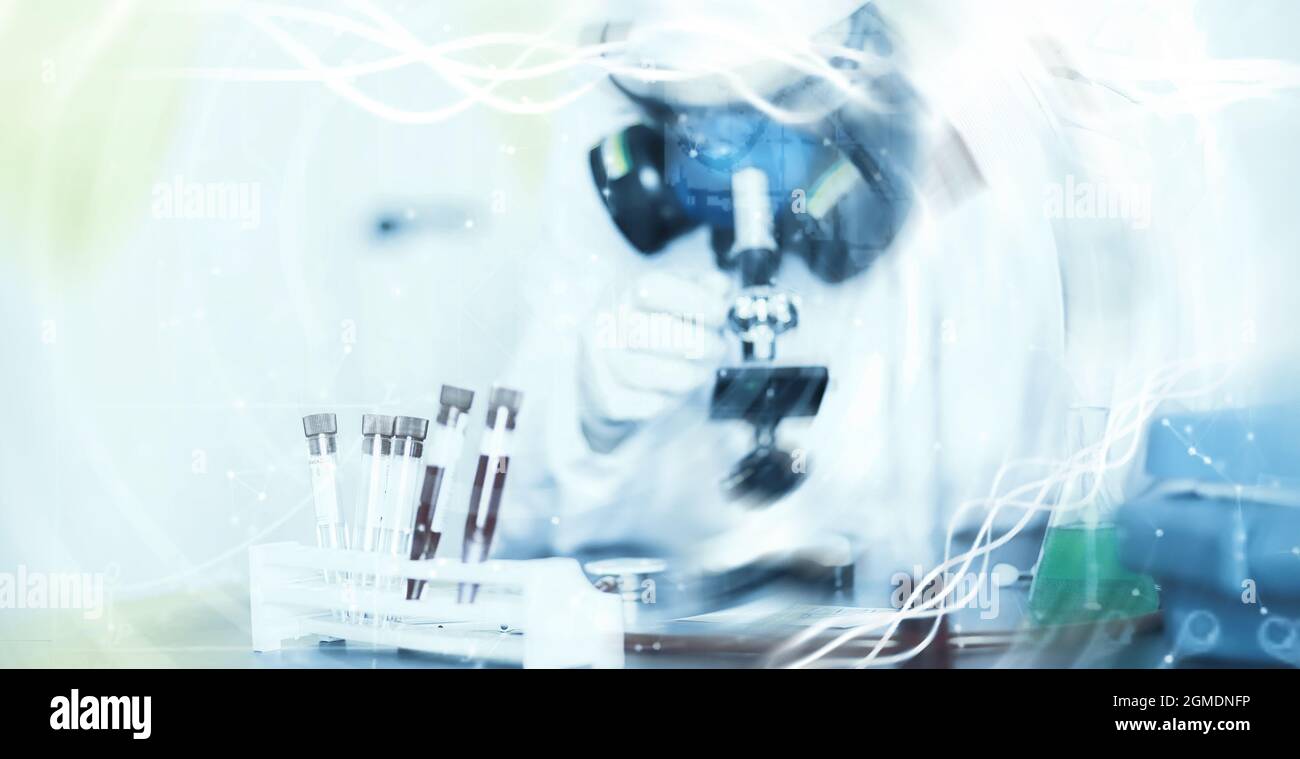 A scientist researcher in the laboratory is testing drugs for treatment ...