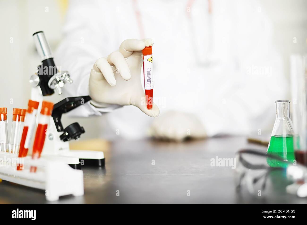 A scientist researcher in the laboratory is testing drugs for treatment ...