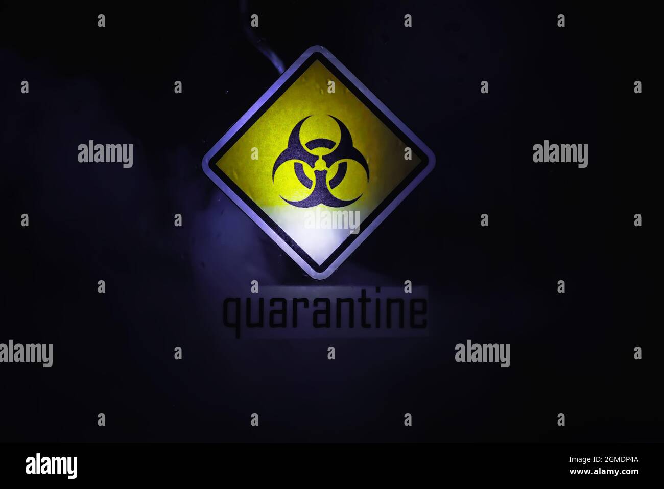 Quarantine. Quarantine warning sign on a glass door in hospital ...