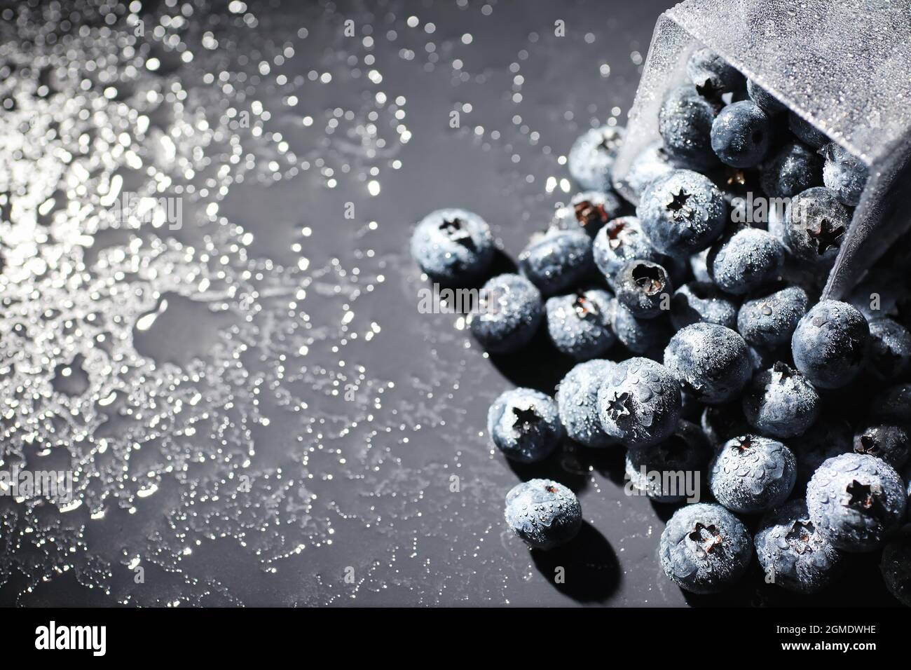 Water drops on ripe sweet blueberry. Fresh blueberries background with ...