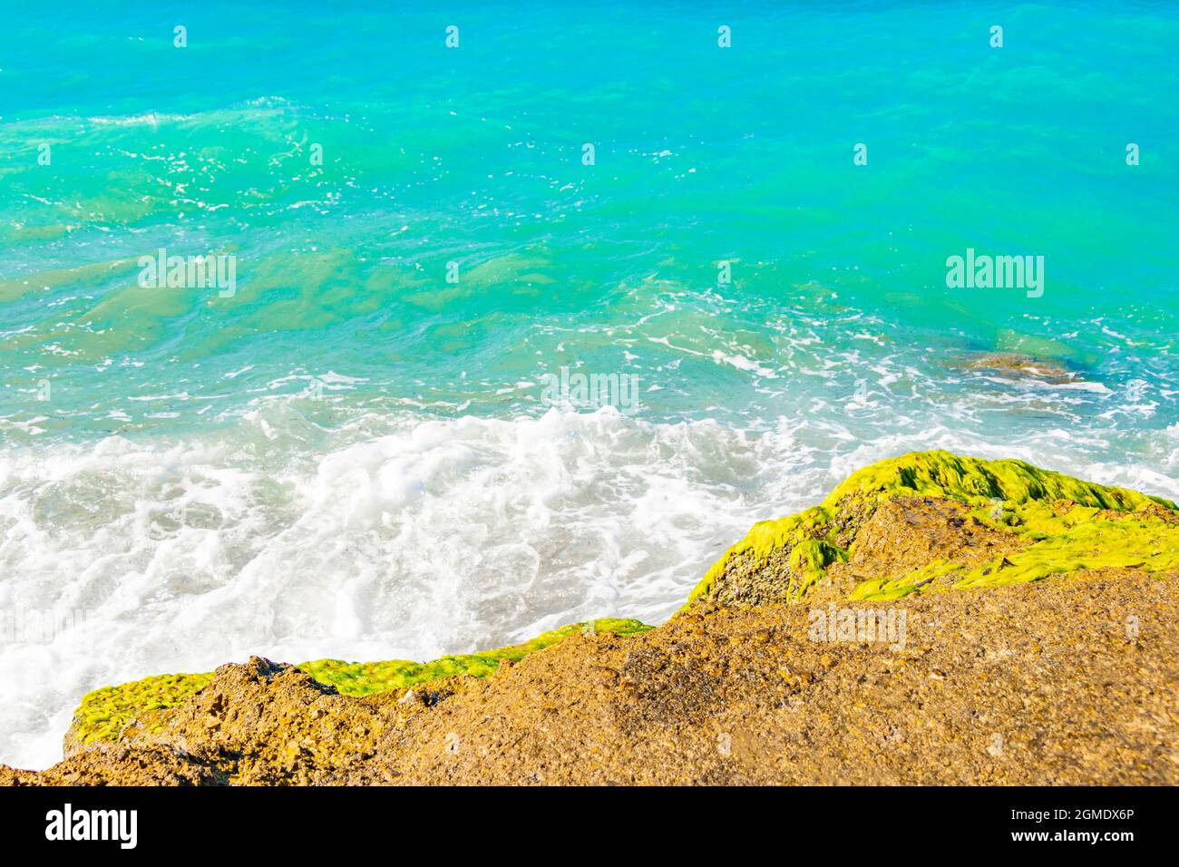 Turquoise blue clear water and and rocks at Kremasti beach on Rhodes ...