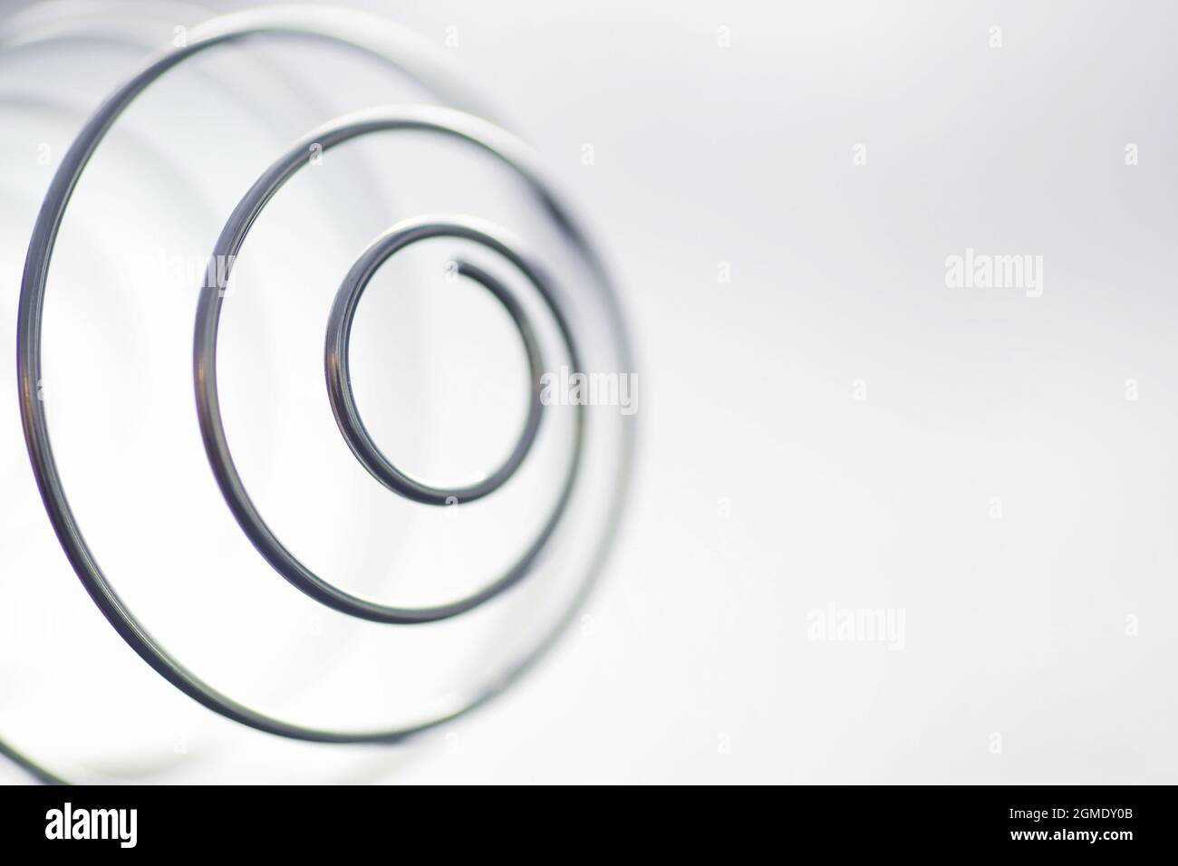 Metal spiral. The concept endless turns. Golden ratio. The concept of ...