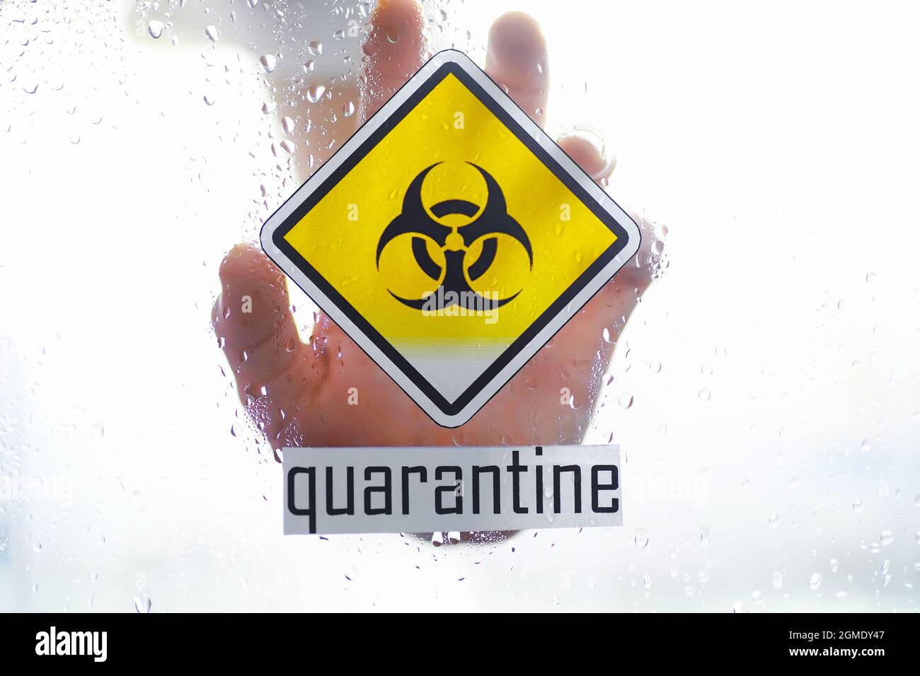 Quarantine. Quarantine warning sign on a glass door in hospital ...