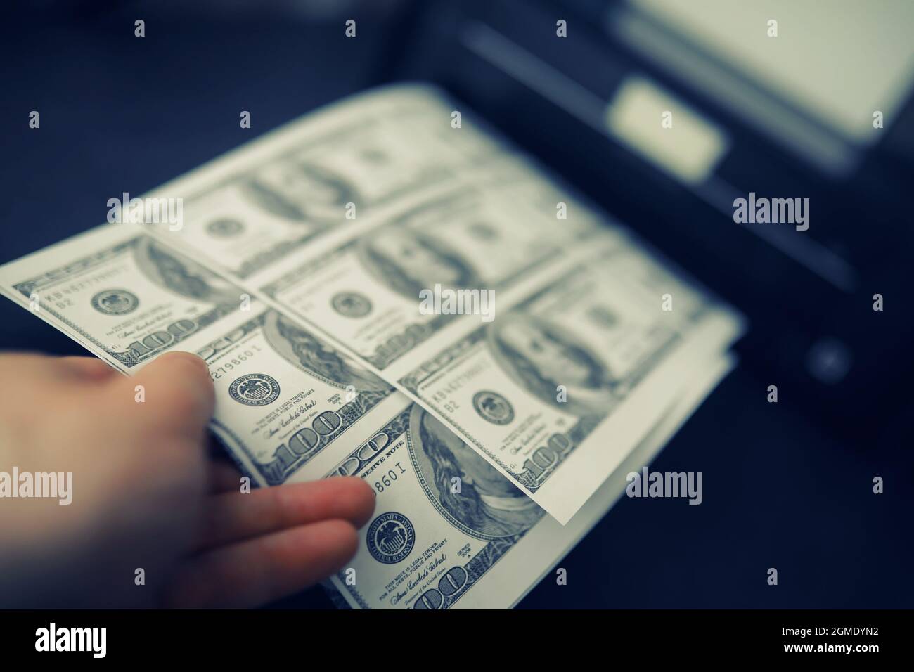 The concept of global economic crisis. Illegal production of US dollars ...