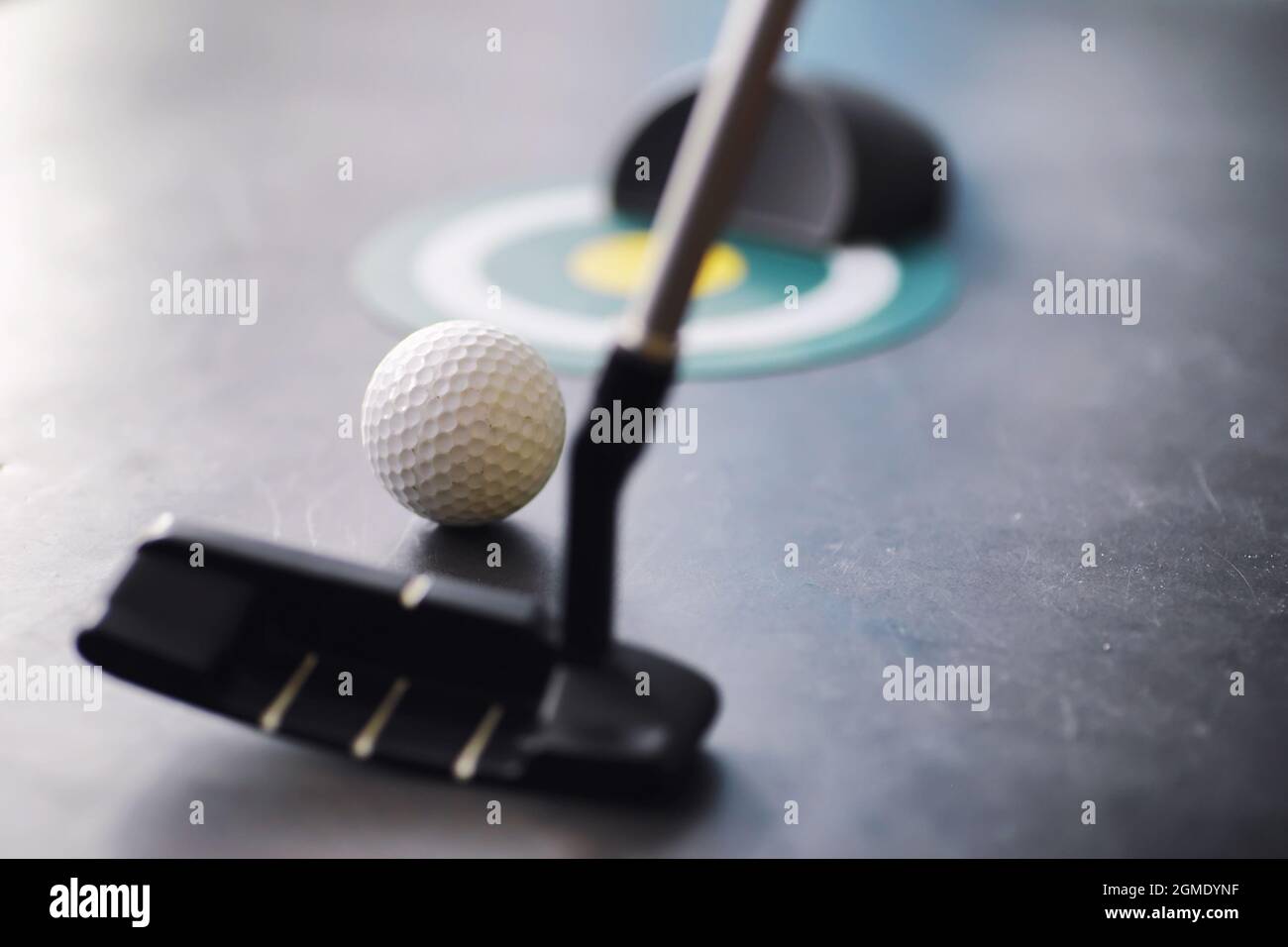 Sport and healthy lifestyle. Mini golf. White golf ball and set ...