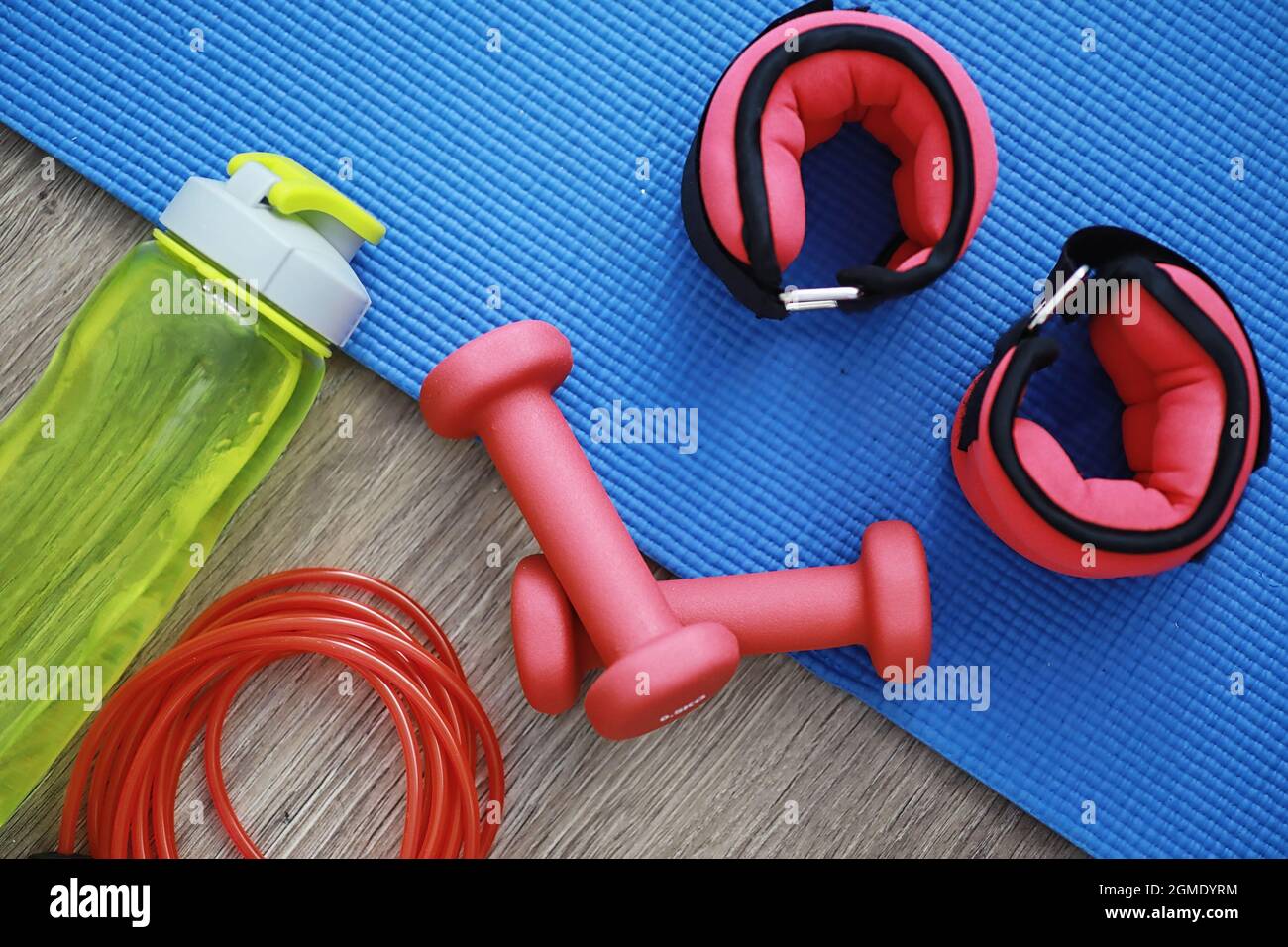 Sport and healthy lifestyle. Accessories for sports. Yoga mat dumbbell ...