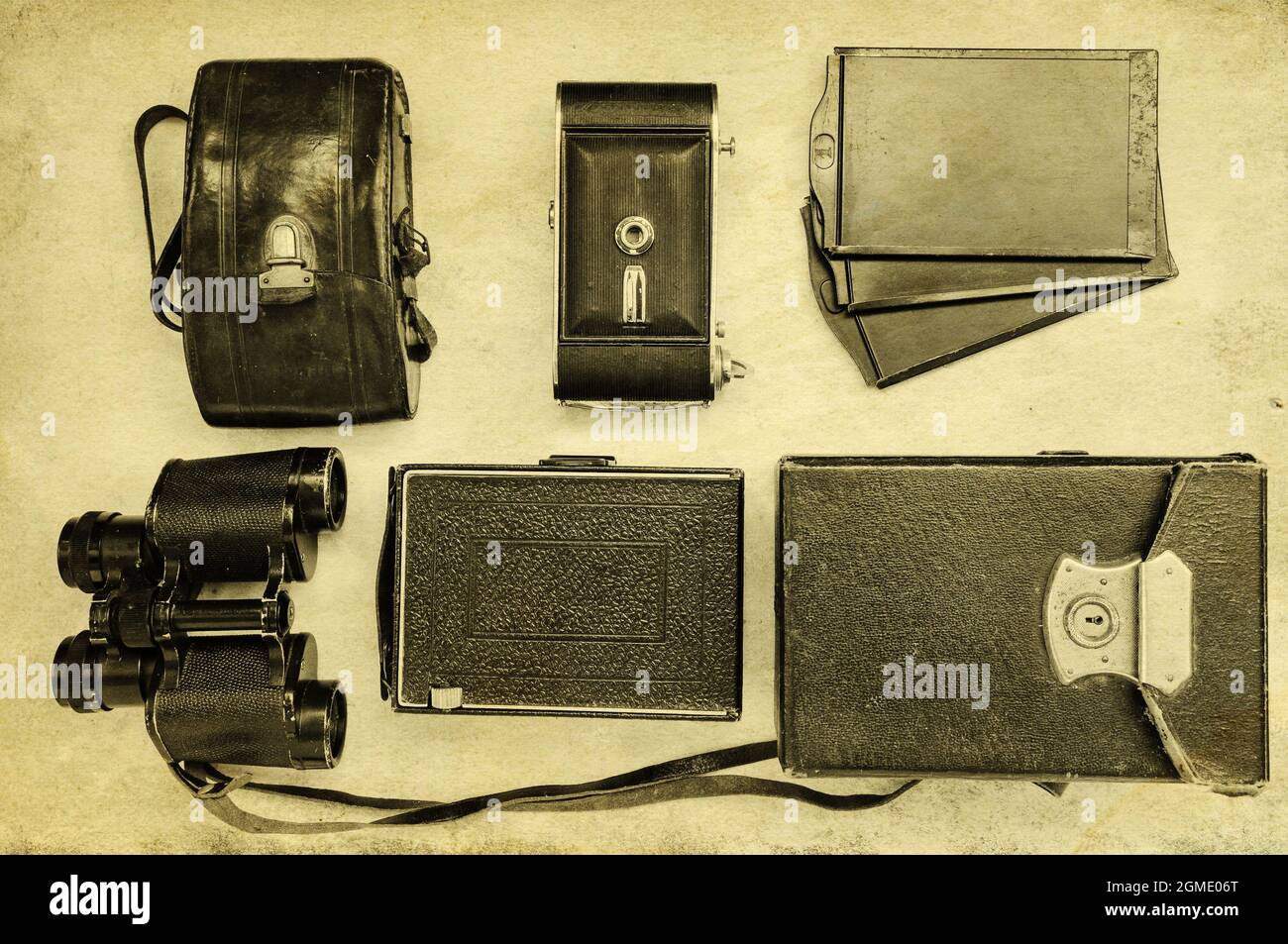 Vintage cameras with cases on a light background. Top view Stock Photo ...
