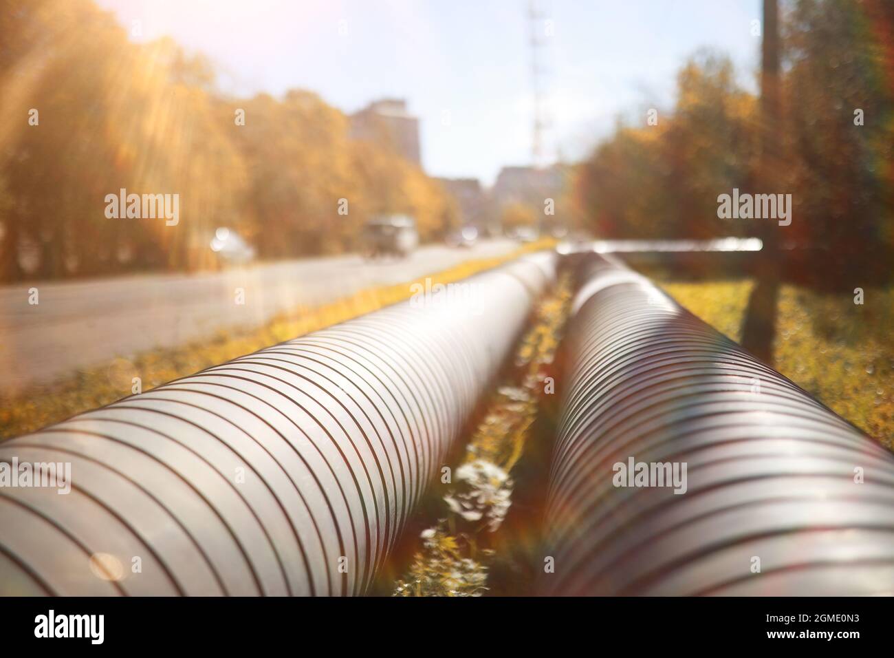 Industrial pipes on street construction Stock Photo - Alamy