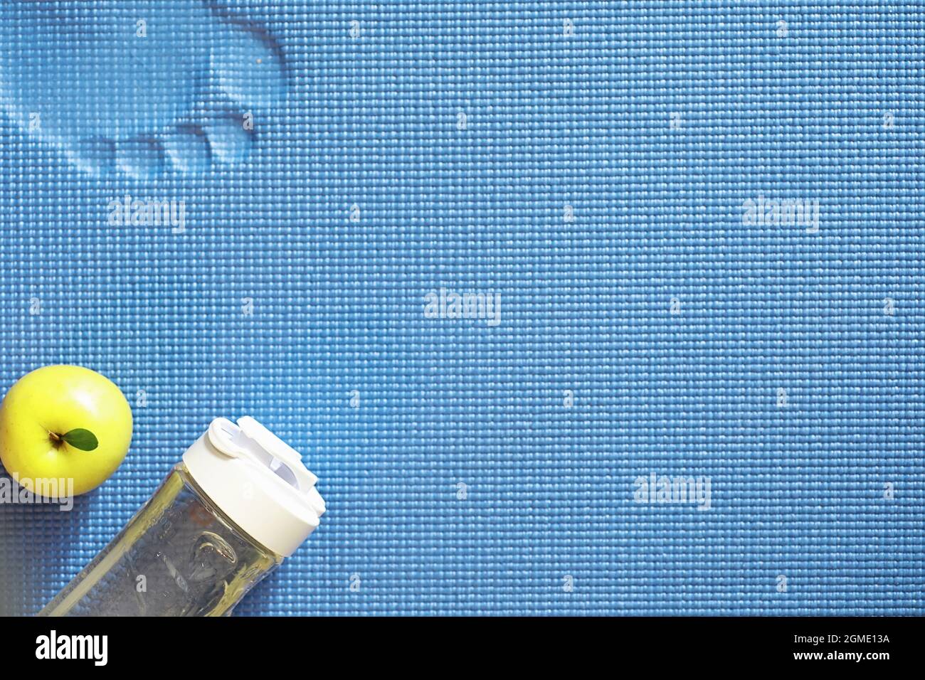 Mat for practicing yoga on a floor. Healthy lifestyle Stock Photo - Alamy