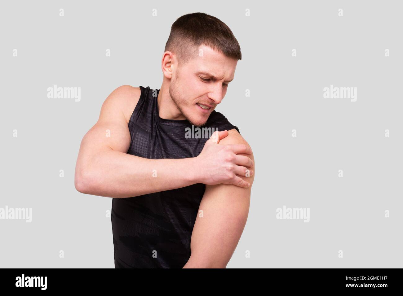 Sport man Holding Shoulder. Man Having Injury. Sport man Shoulder ...