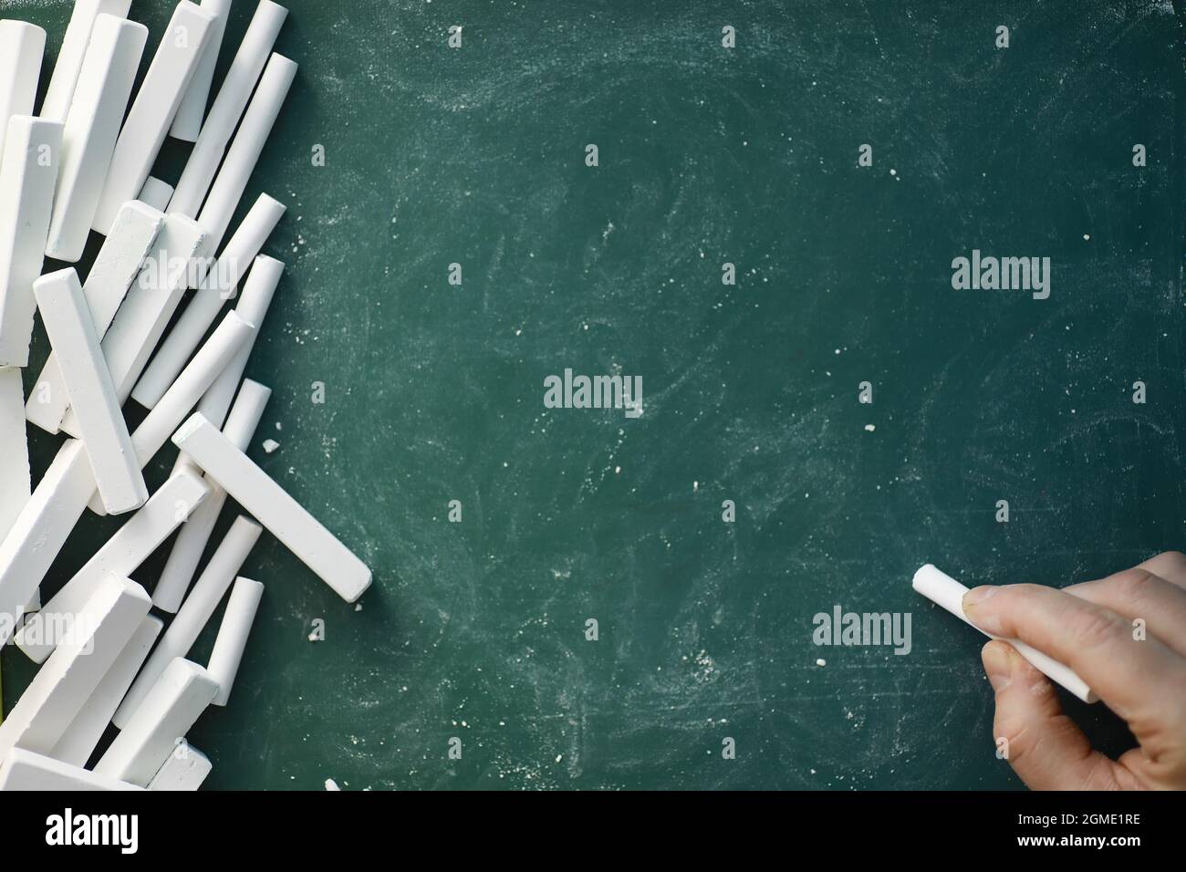 Chalkboard. Crayons for writing on blackboard. Learning concept. School ...