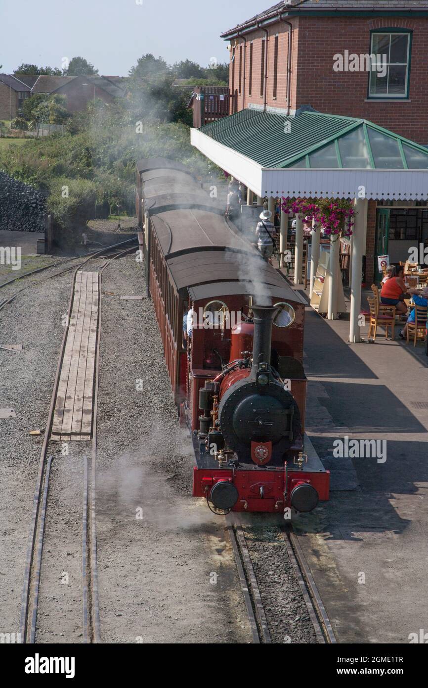 A train waits at Tywyn Wharf Station at the The Talyllyn Railway ...