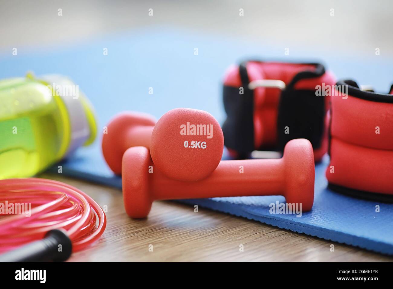 Sport and healthy lifestyle. Accessories for sports. Yoga mat dumbbell ...