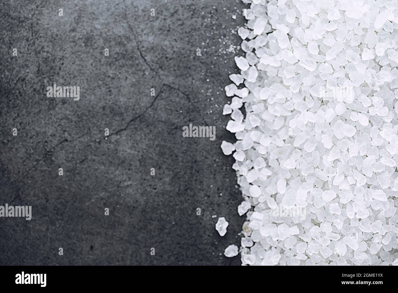 Large sea salt. Spice. Mortar and pestle for grinding salt Stock Photo ...