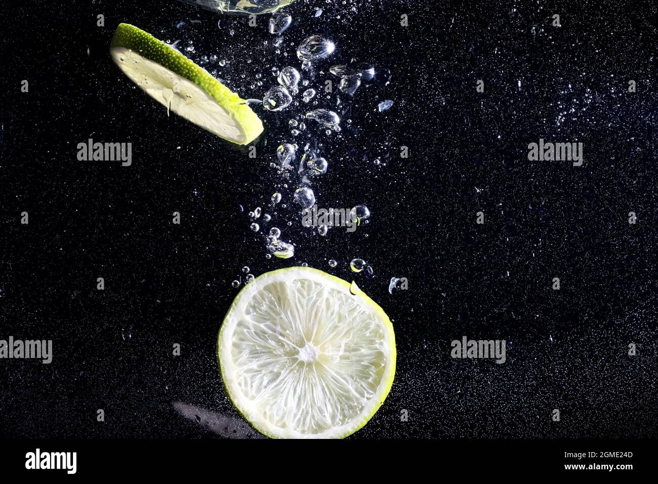 Water drops on ripe sweet lemon. Fresh lime background with copy space ...