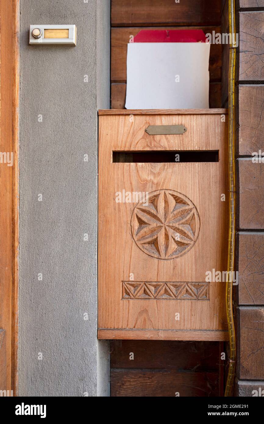 Antique wooden mailbox carved for a house Stock Photo - Alamy