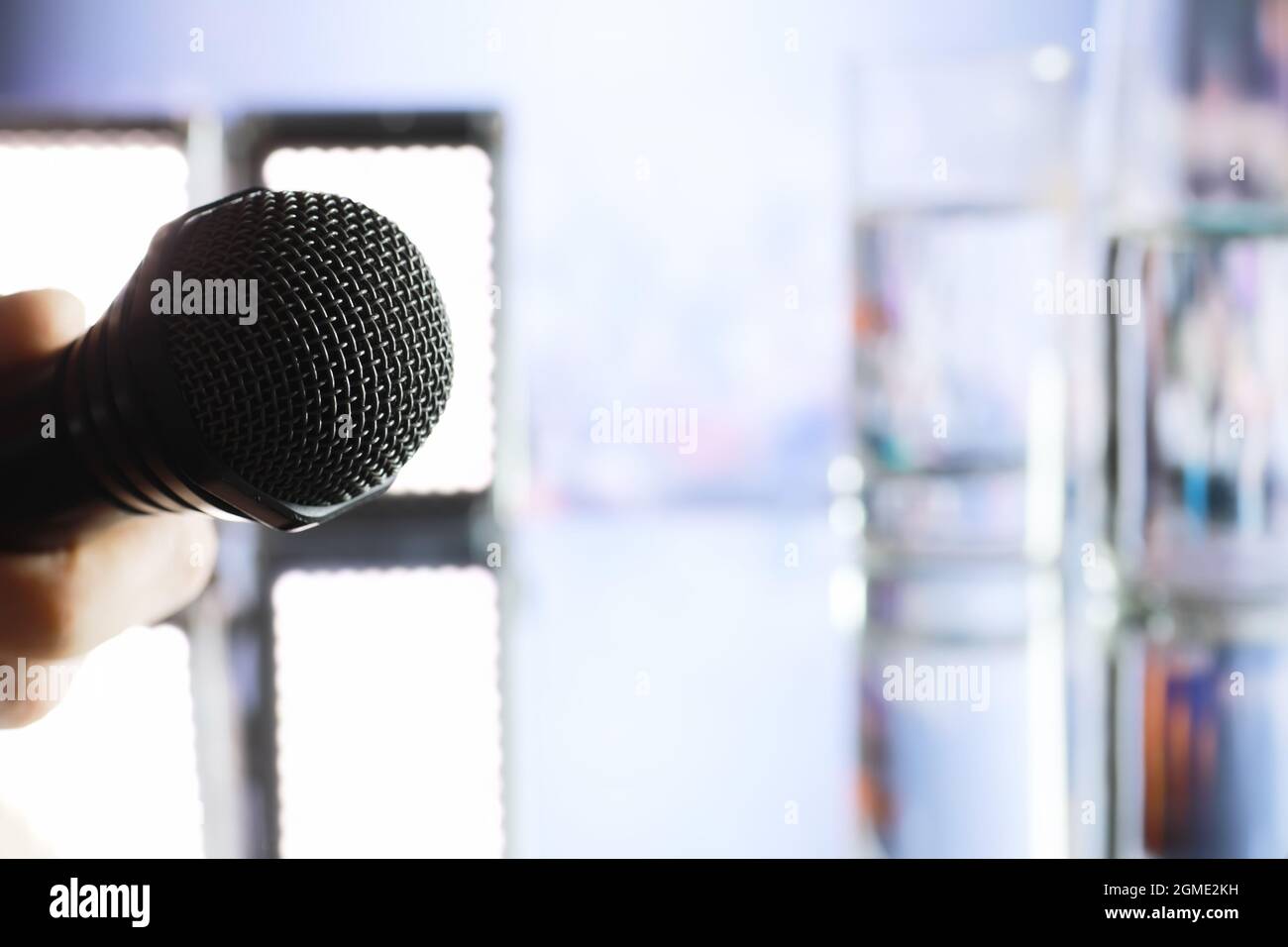 The microphone on the stage in front of the hall. Performance on stage ...