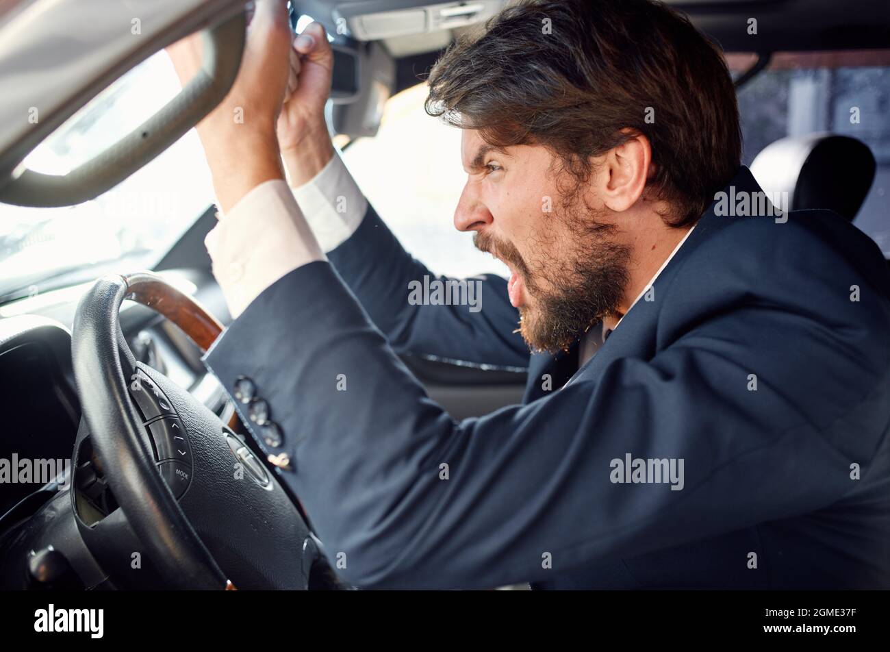emotional man Driving a car trip luxury lifestyle service Stock Photo ...