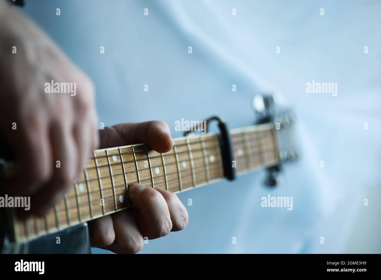 An acoustic guitar for artist playing a stringed musical instrument on ...