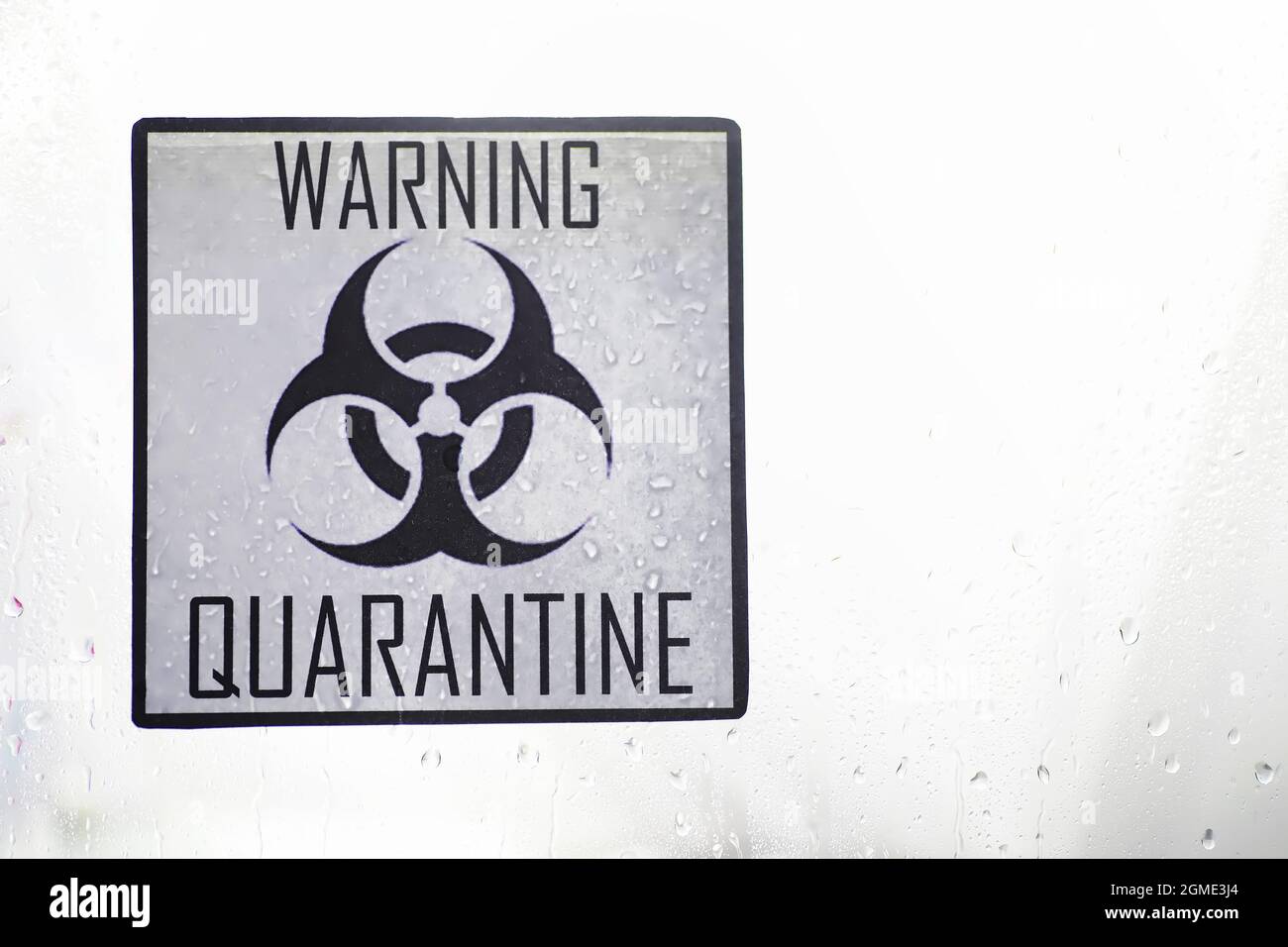Quarantine. Quarantine warning sign on a glass door in hospital ...