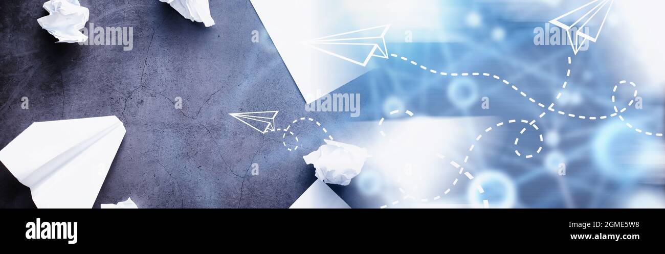 Paper airplane on the table. Origami model on a dark background ...