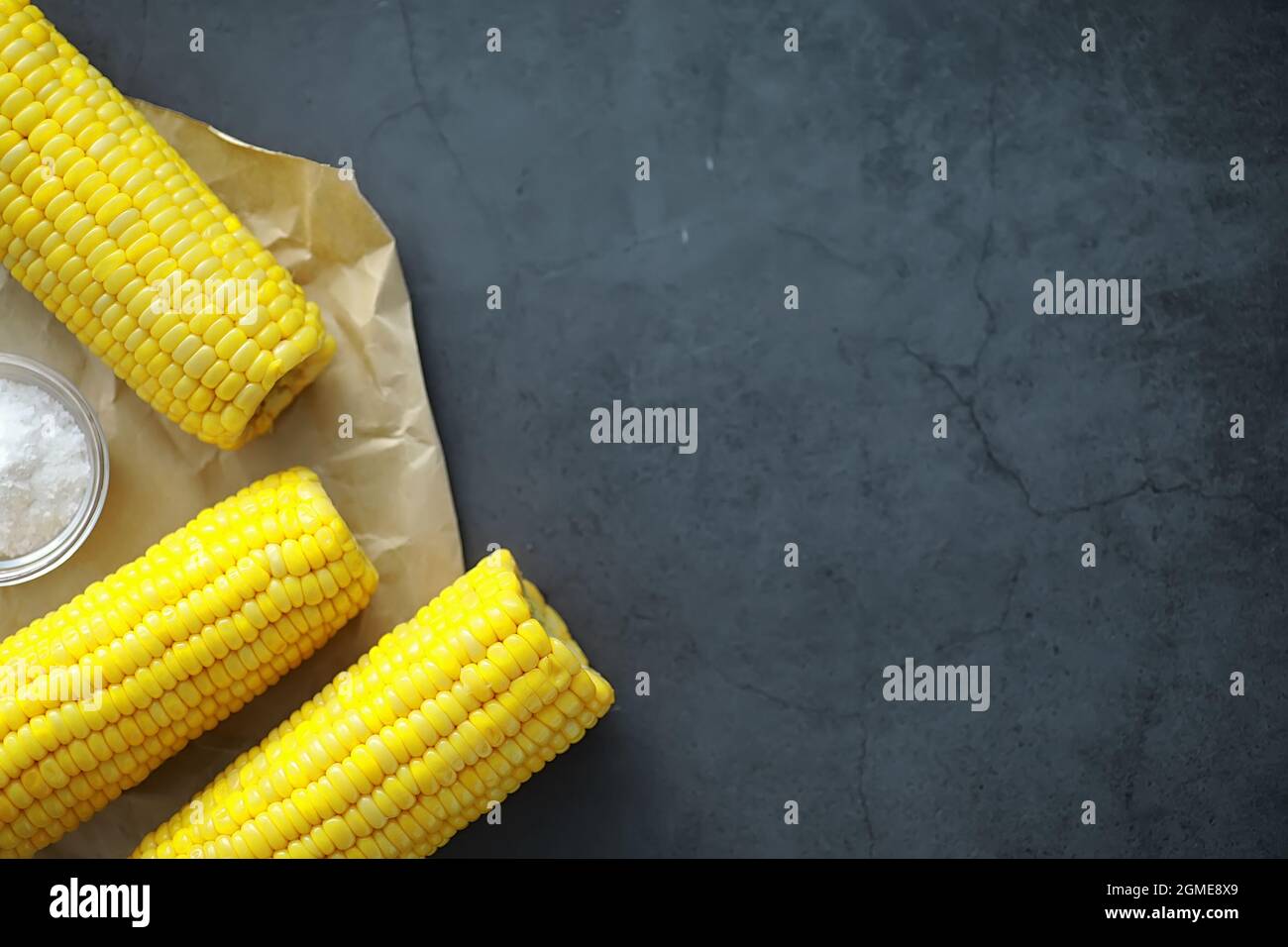 Freshly made fragrant ear of corn with salt. Farm snack fresh corn ...