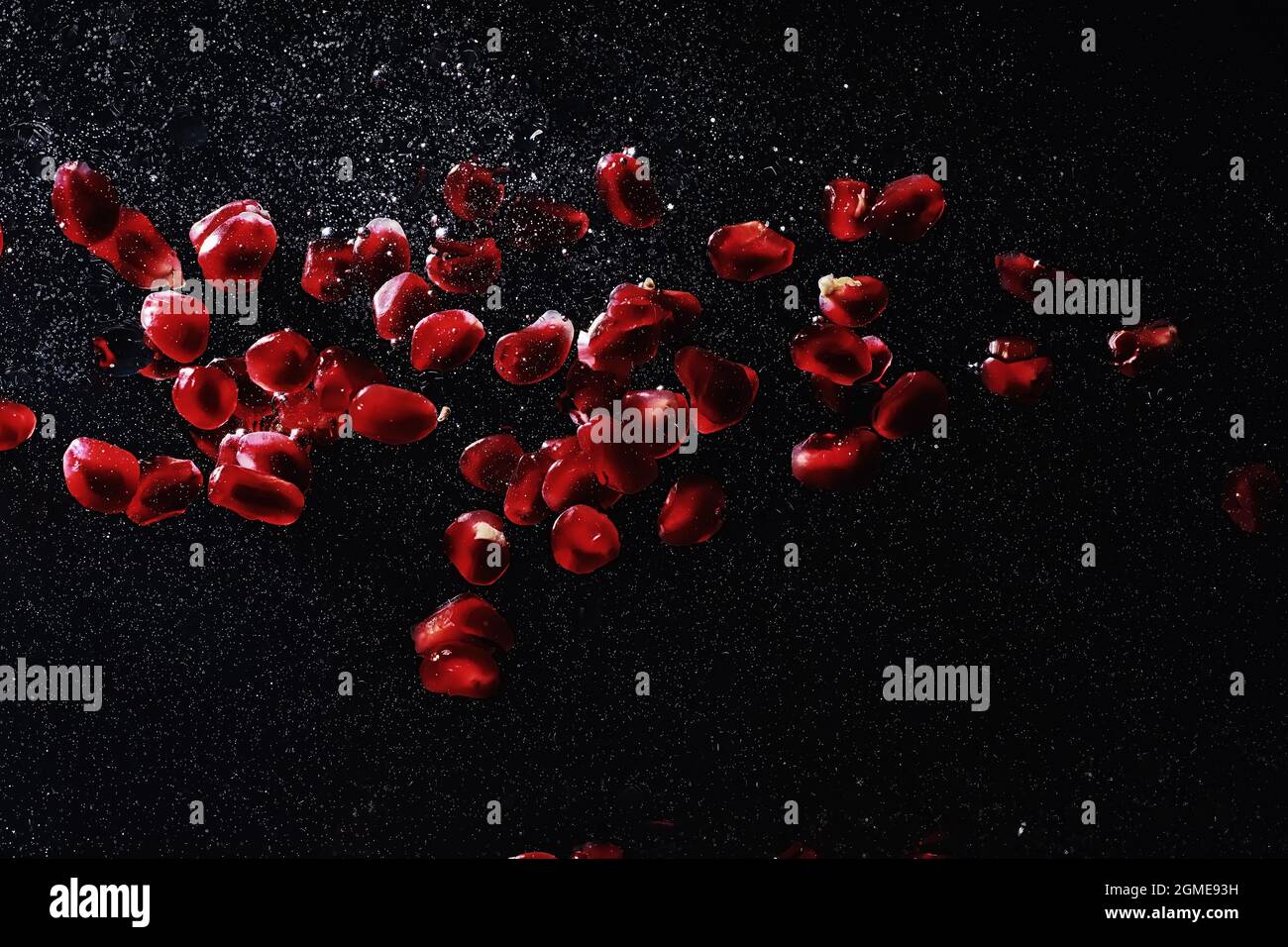 Water drops on ripe sweet pomegranate seeds. Fresh pomegranate ...