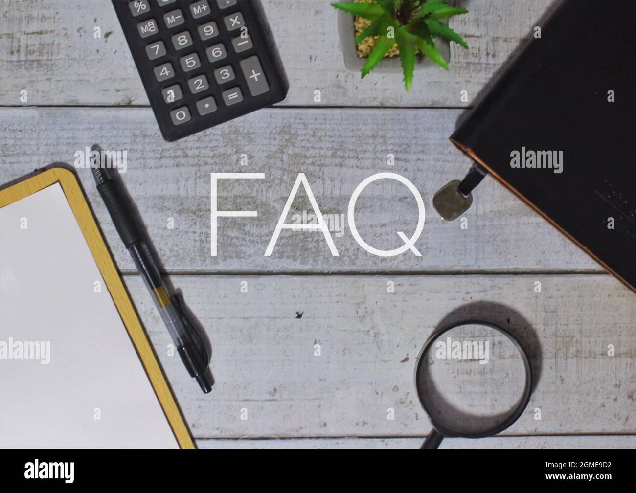 Book magnifying glass calculator hi-res stock photography and images ...