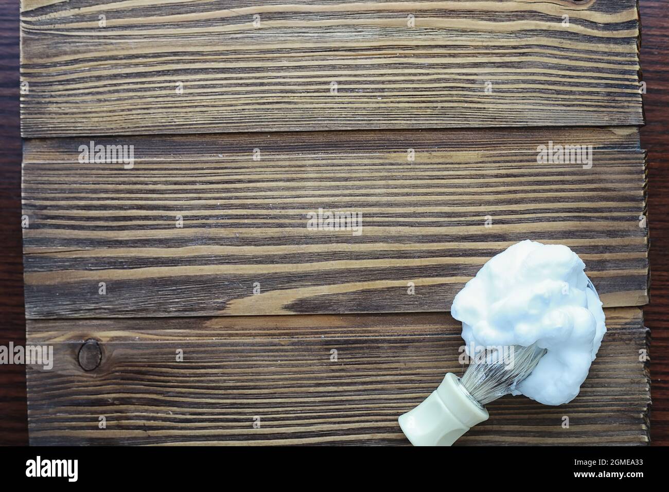 Shaving accessories on a wooden texture background. Tools. Disposable ...