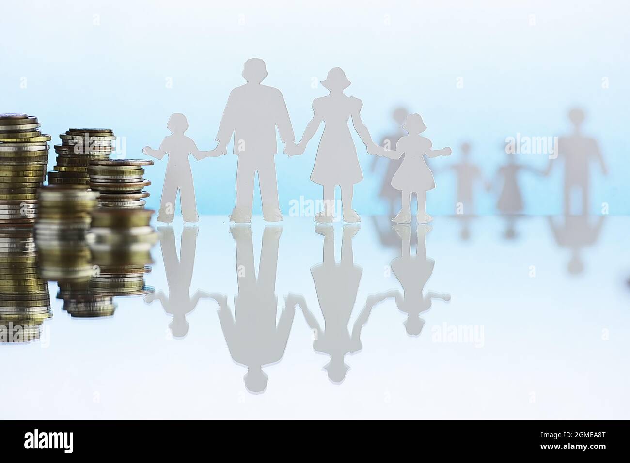Silhouette of four people and stacks of money. Family concept. Family ...