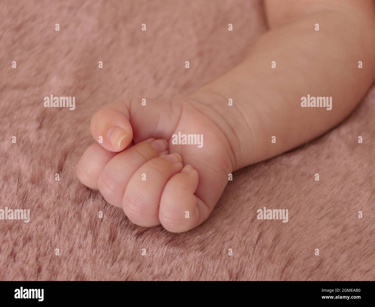 Baby fist hi-res stock photography and images - Alamy