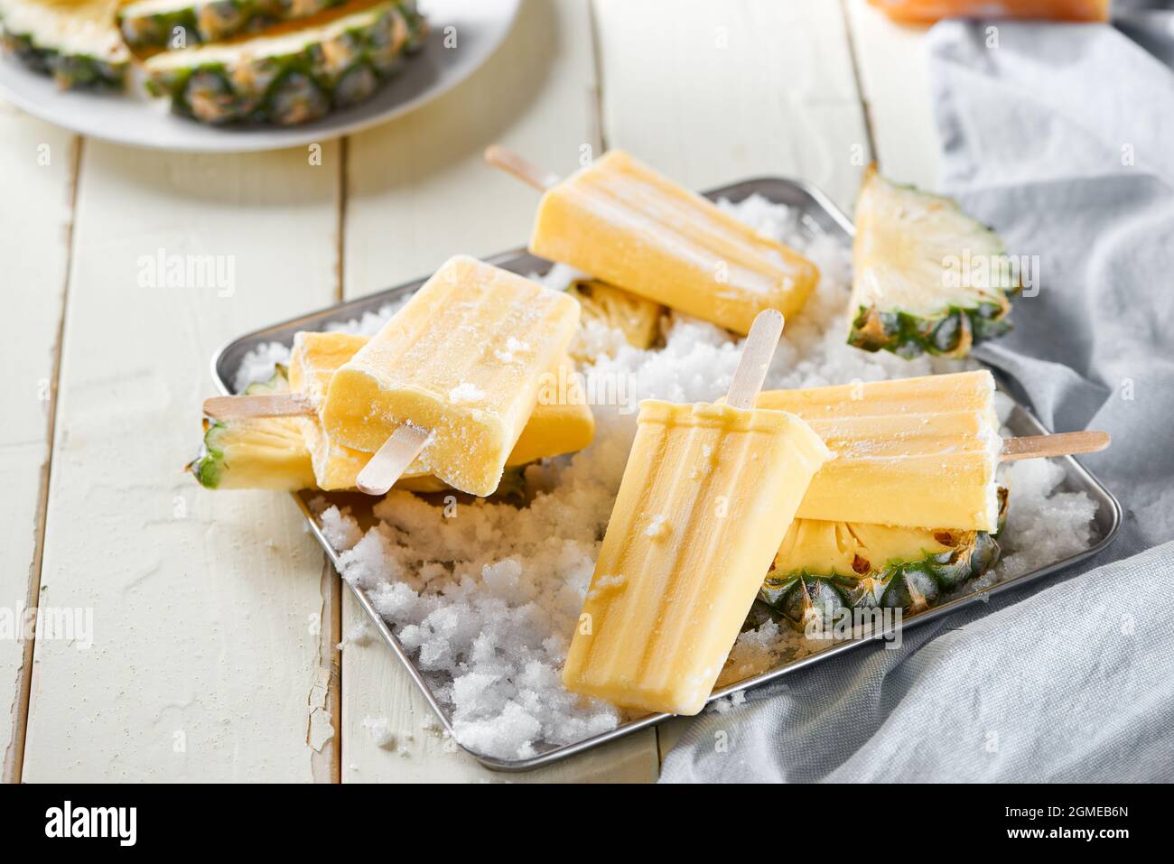Homemade ice cream or popsicles from pineapple. Frozen fruit pulp ...