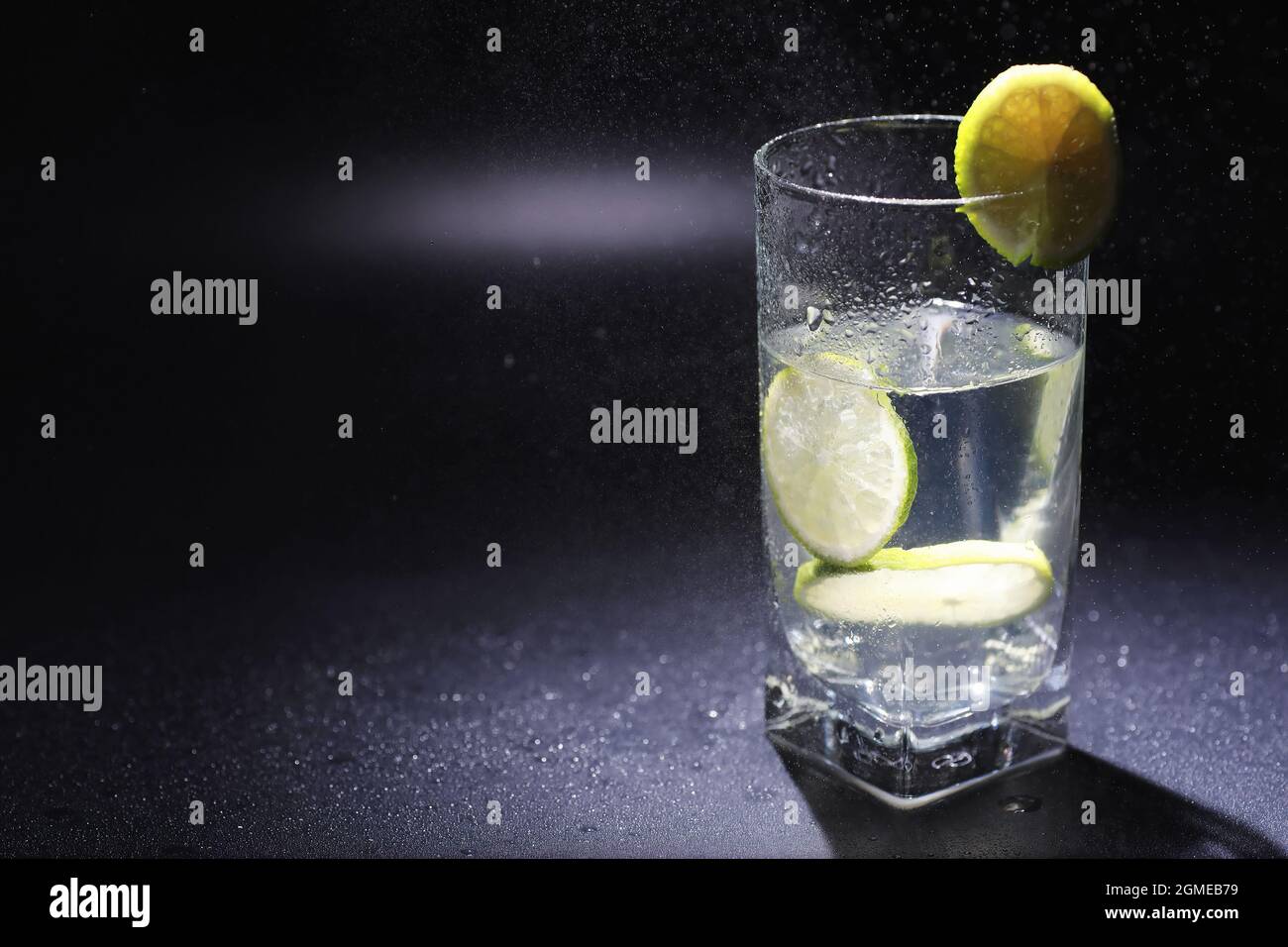 Lime water. Drinking water with fresh lime. Mineral water. Healthy ...