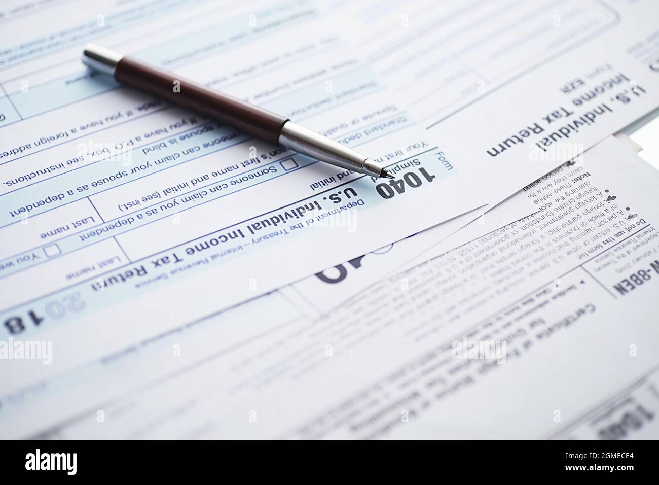 Annual tax reporting. Tax form on the table. Financial statements ...
