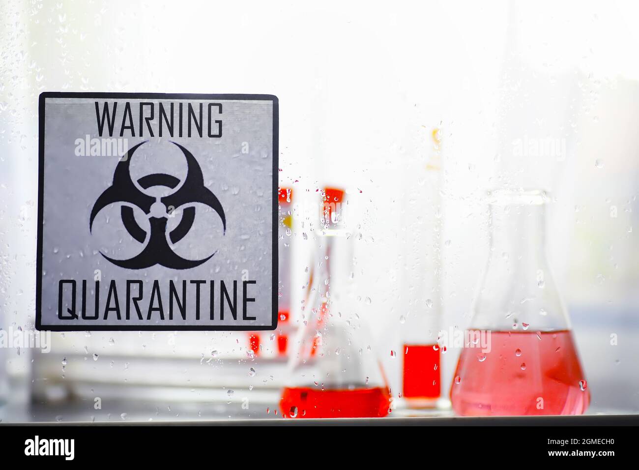 Quarantine. Quarantine warning sign on a glass door in hospital ...