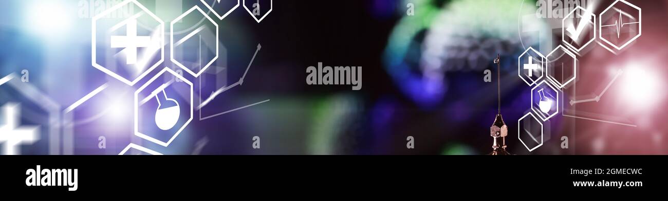 Medical syringe with a needle and a cure for virus. A drop of drug ...