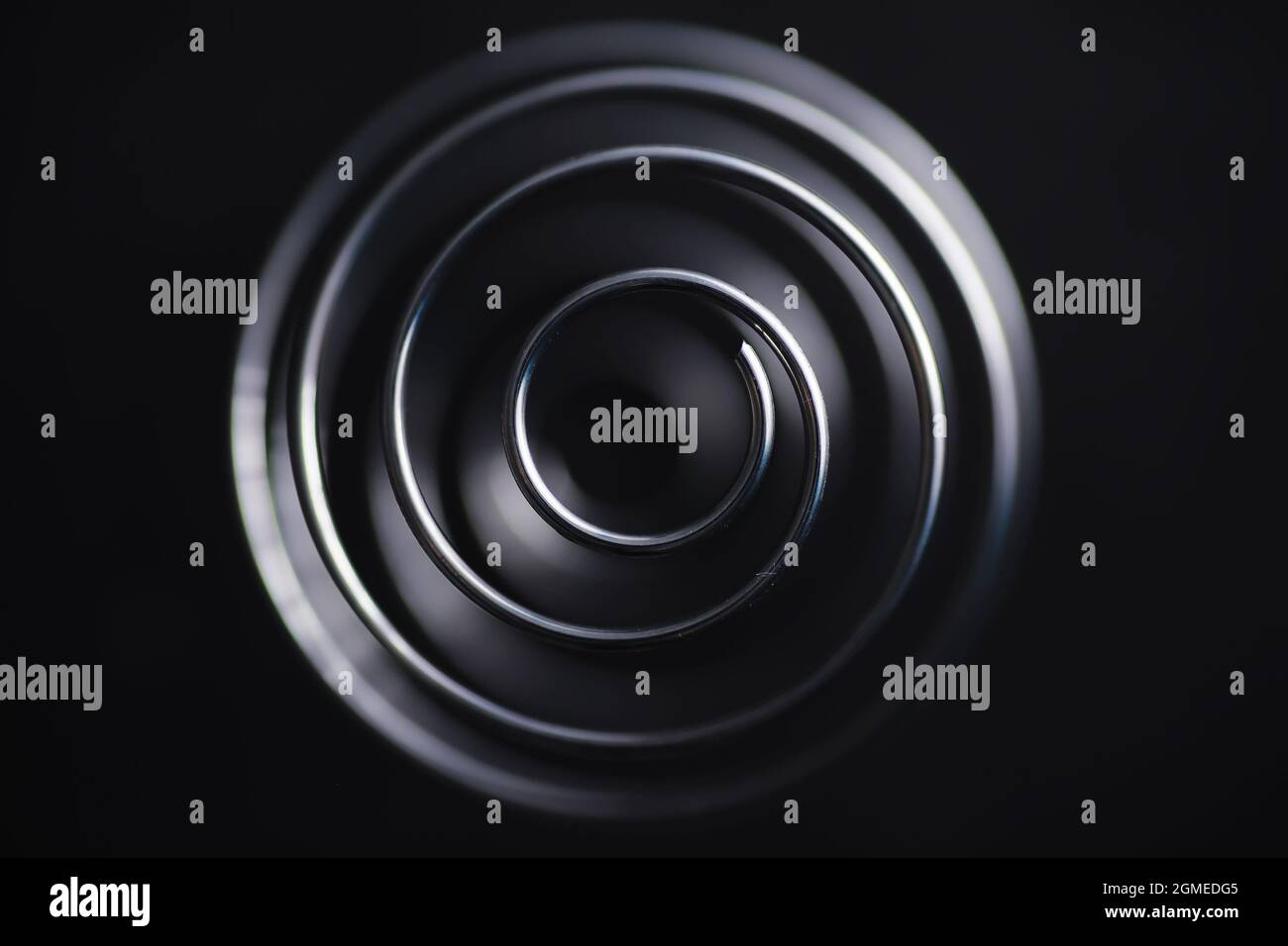 Metal spiral. The concept endless turns. Golden ratio. The concept of ...