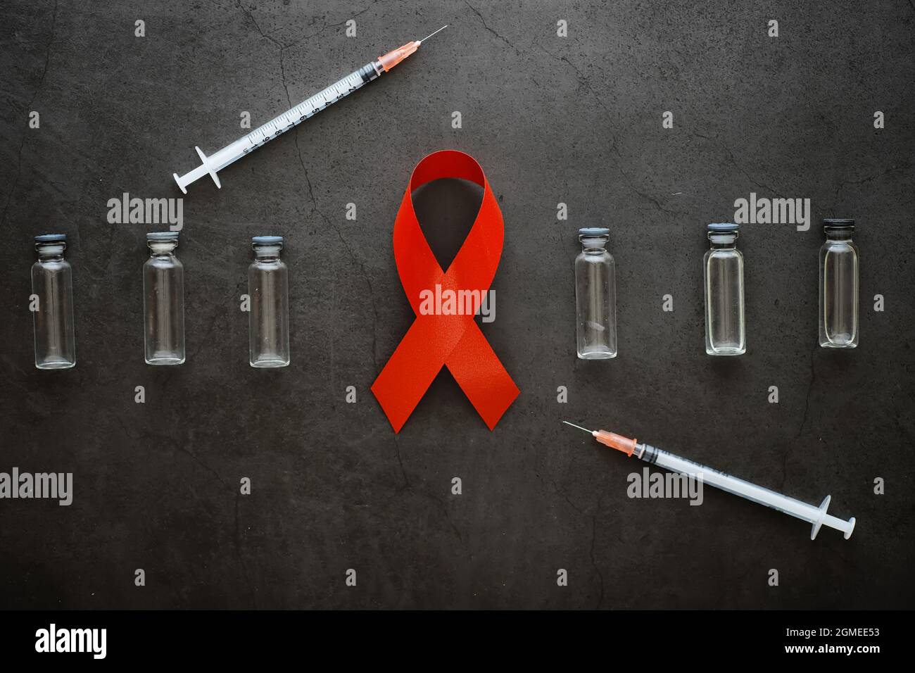 Symbol of human immunodeficiency virus disease. Red ribbon. A helping ...