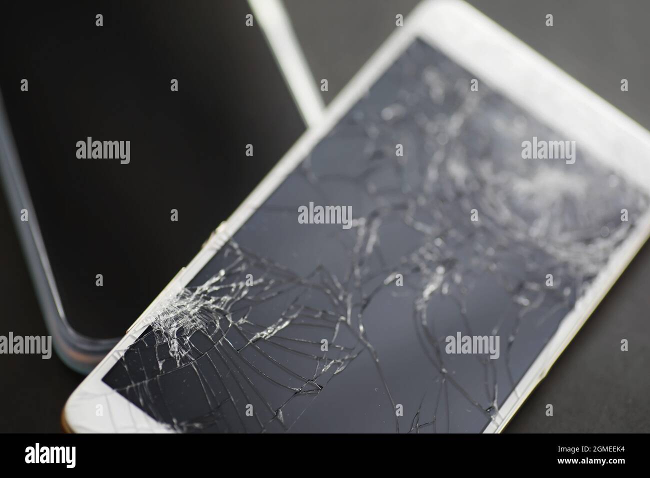 Crack on the glass. Broken screen. Broken phone. Cracked glass ...