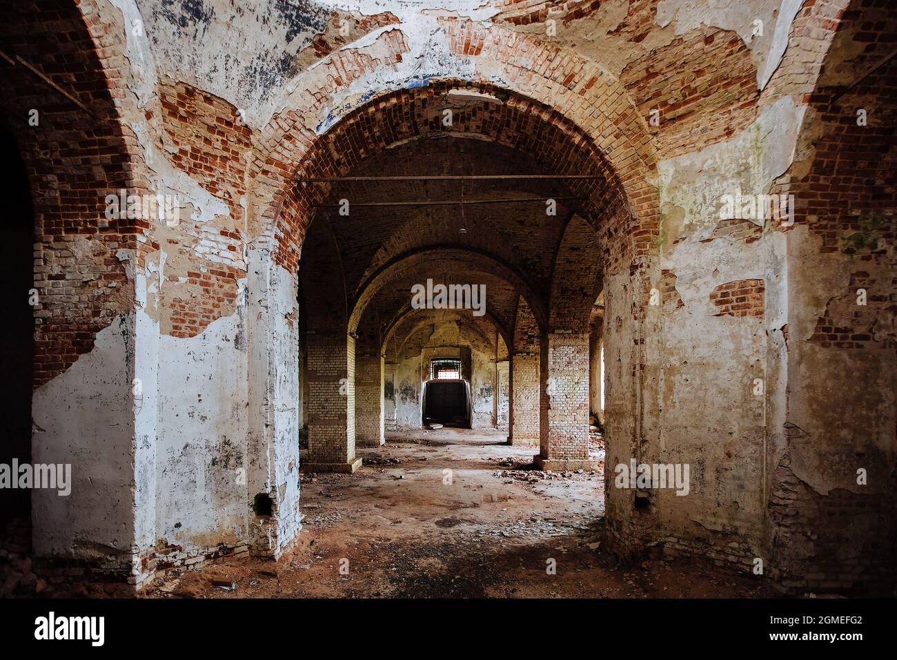 Large ancient vaulted hall of abandoned building Stock Photo - Alamy