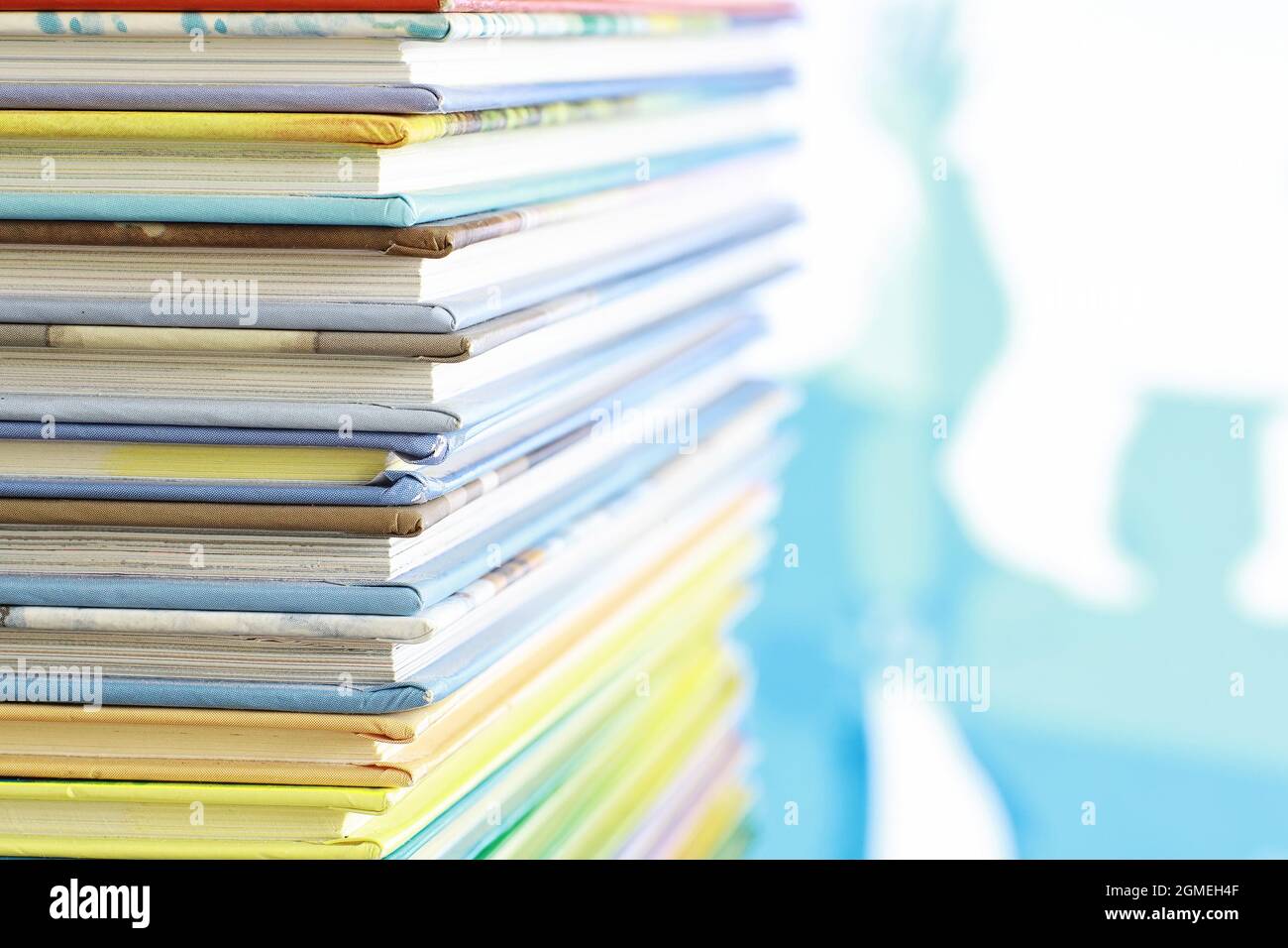 A stack of books. Textbooks on the table. Tutorials are on desk Stock ...