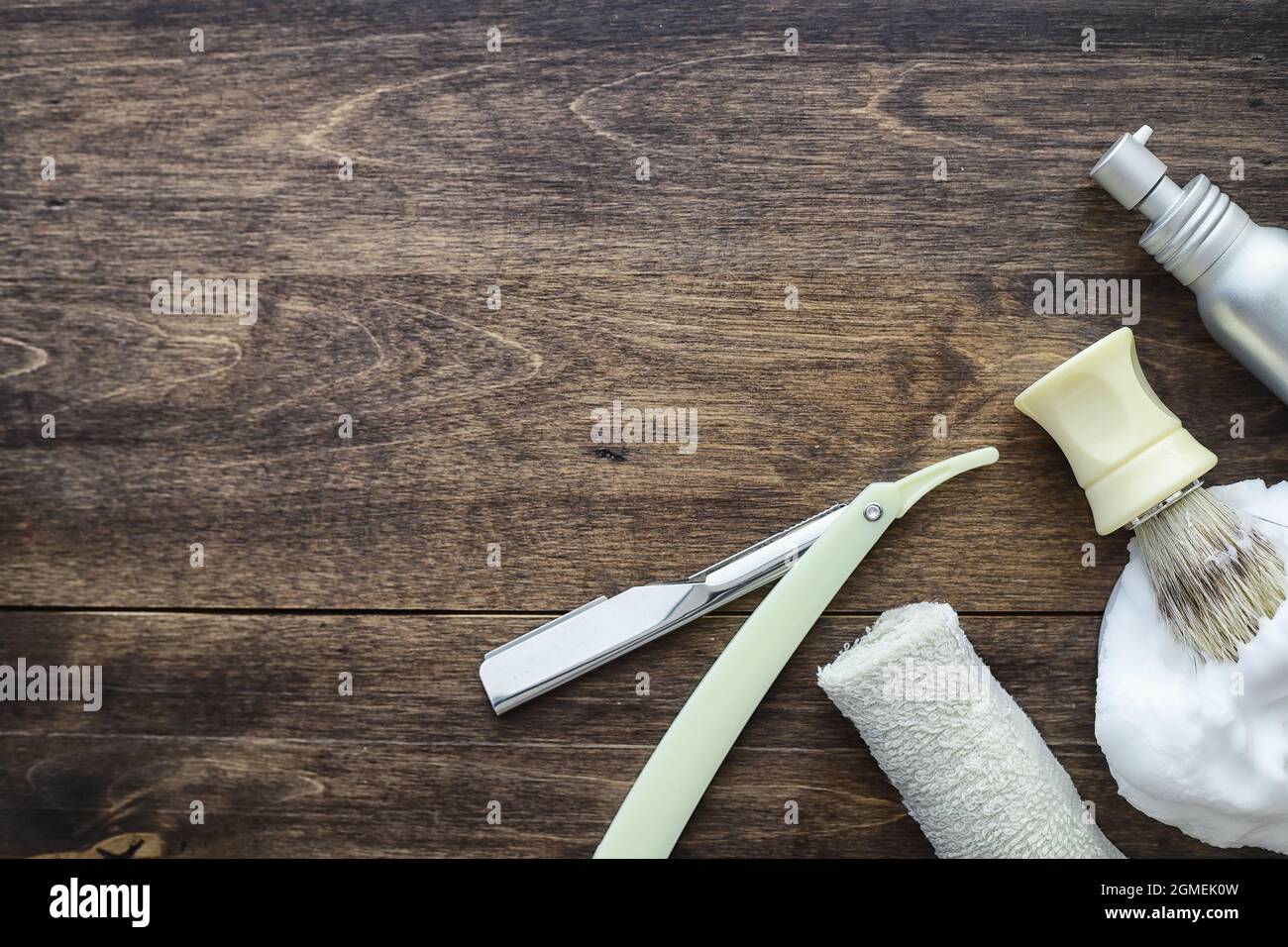 Shaving accessories on a wooden texture background. Tools. Disposable ...