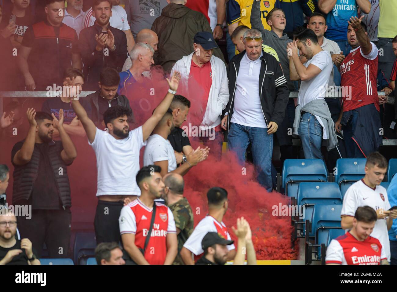 The Arsenal fans set off a red flare before the game Stock Photo - Alamy