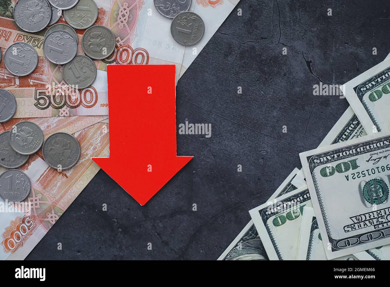 Russian money with the inscription "ruble". Economic crisis. The fall ...