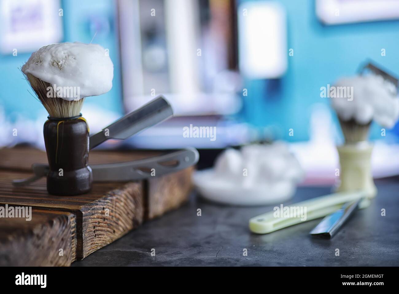 Shaving accessories on a wooden texture background. Tools. Disposable ...