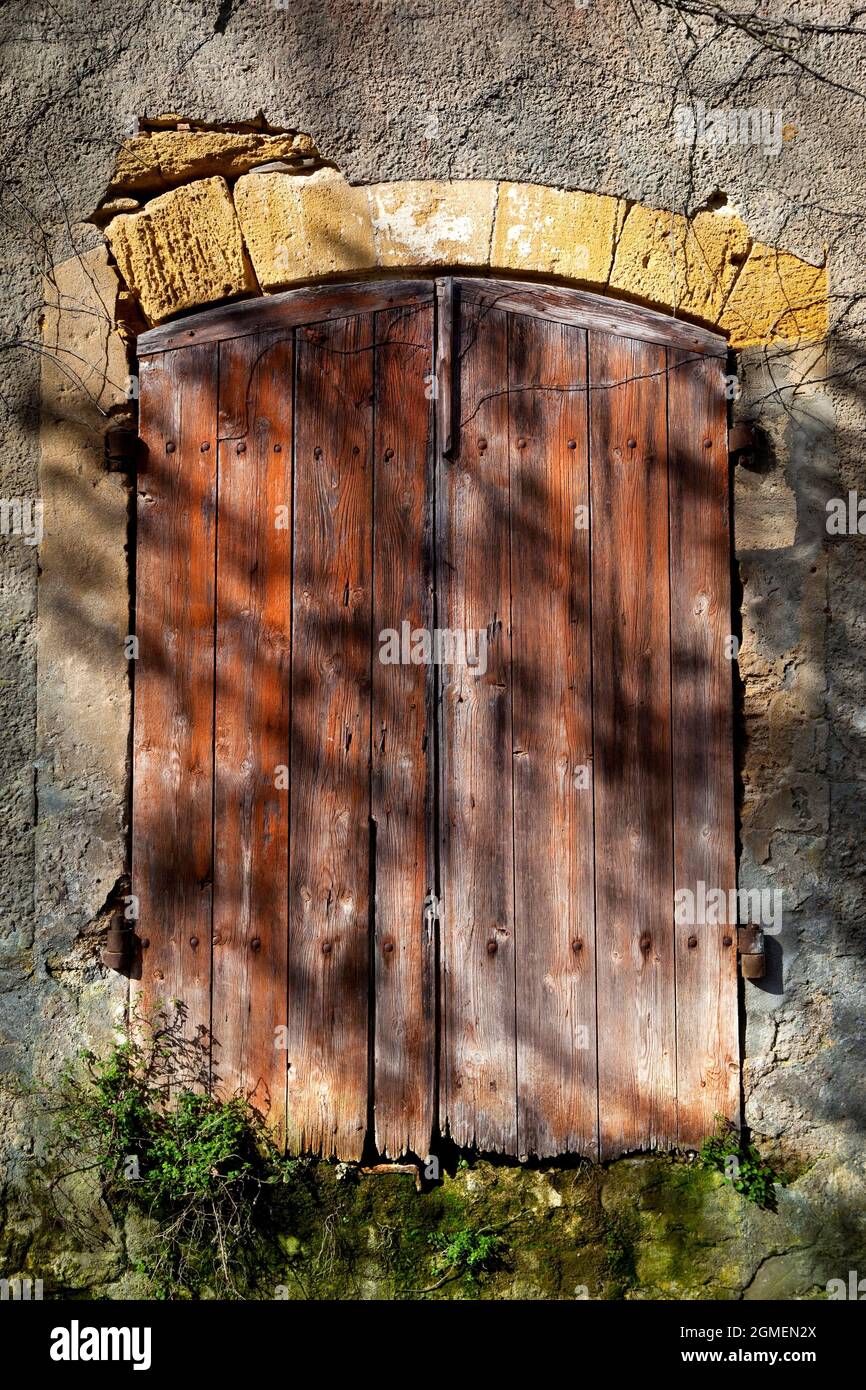 Wooden shutter of a weathered slum in a French village Stock Photo - Alamy