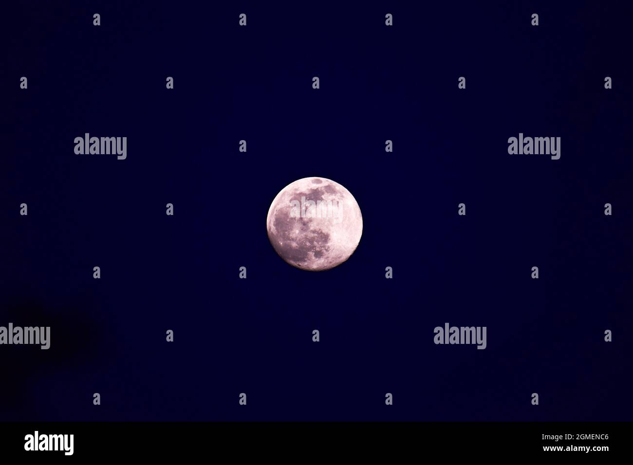 Mesmerizing view of the full moon in a night sky Stock Photo - Alamy