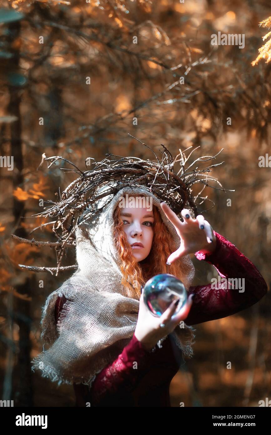 Fortune-teller conducts a ritual in the depths of the forest Stock ...