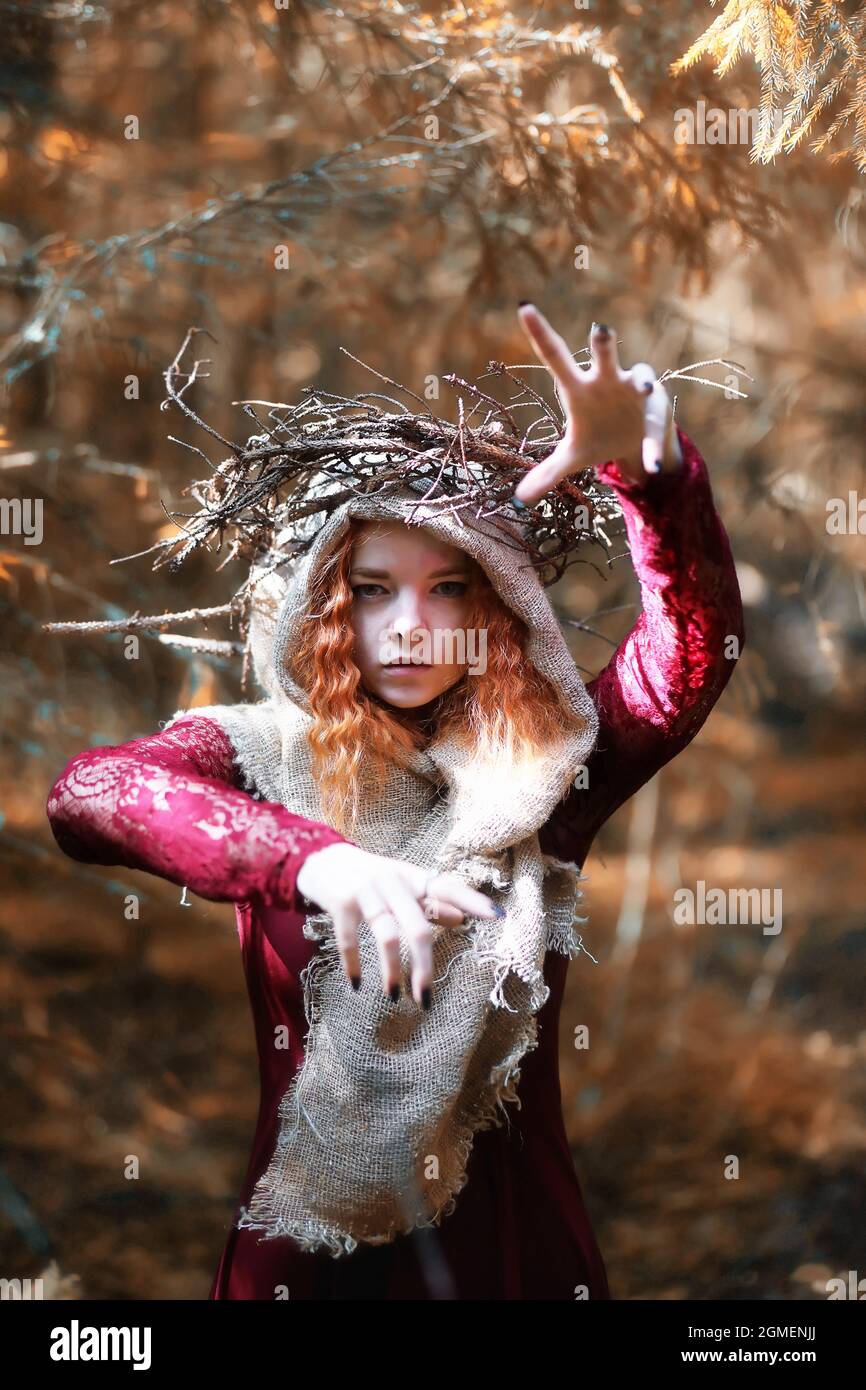 Fortune-teller conducts a ritual in the depths of the forest Stock ...